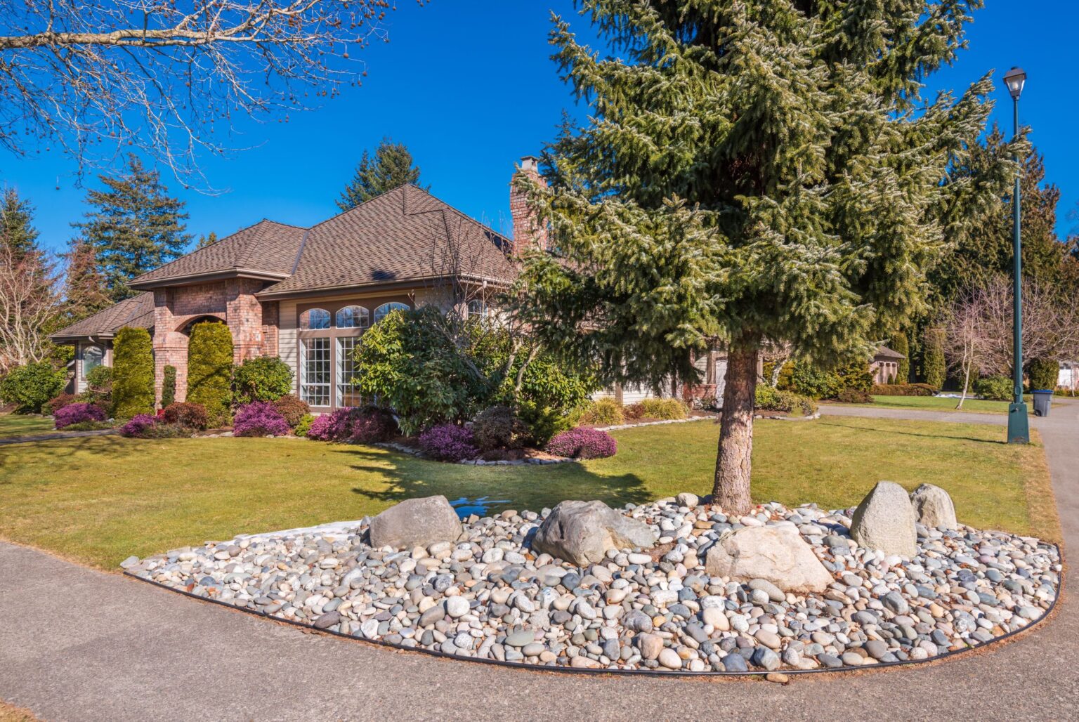 Creative Ways to Use Landscape Boulders - Kiefer Landscaping
